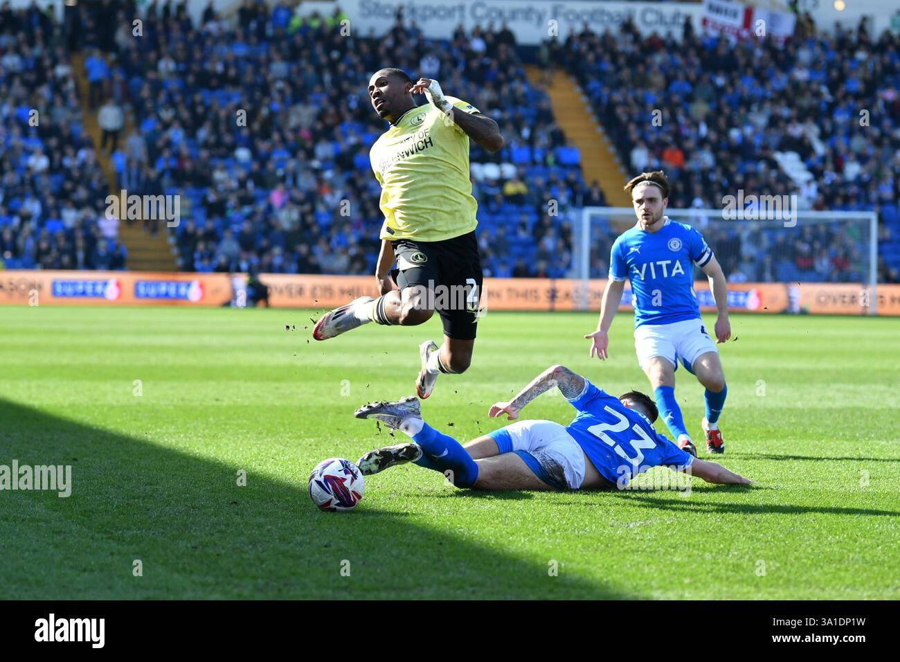 Stockport, England. 8th Mar 2025. Kayne Ramsay is tackled Ryan Rydel ...