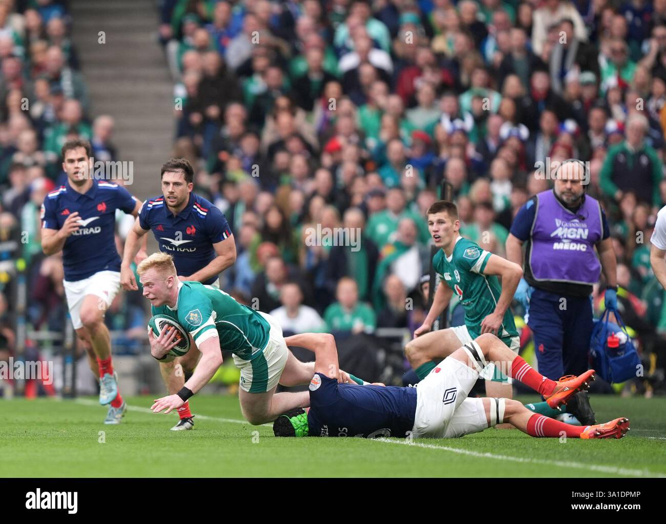 Ireland's Jamie Osborne tackled by France's Francois Cros during the ...
