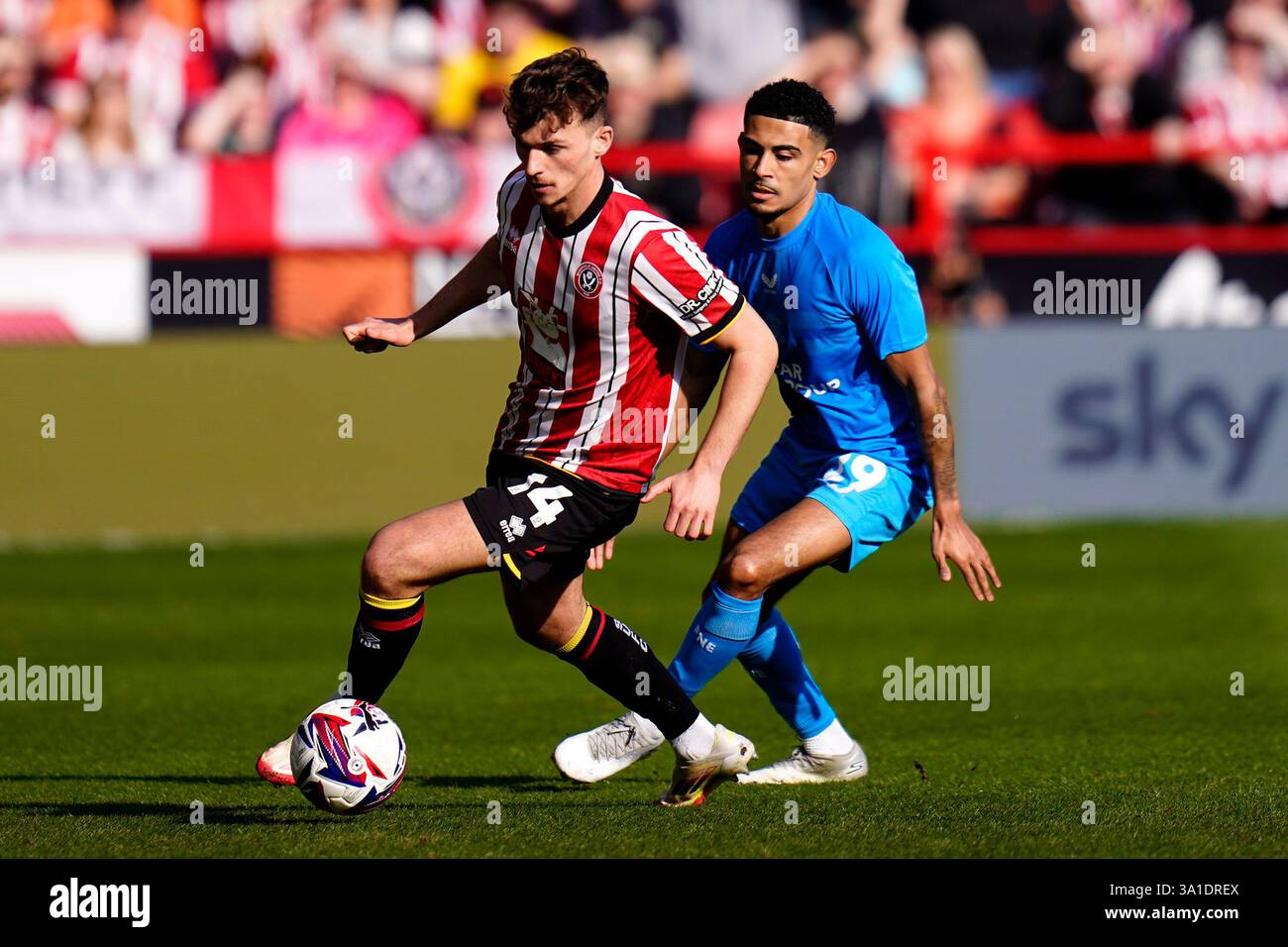 Sheffield United's Harrison Burrows (left) and Preston North End's ...