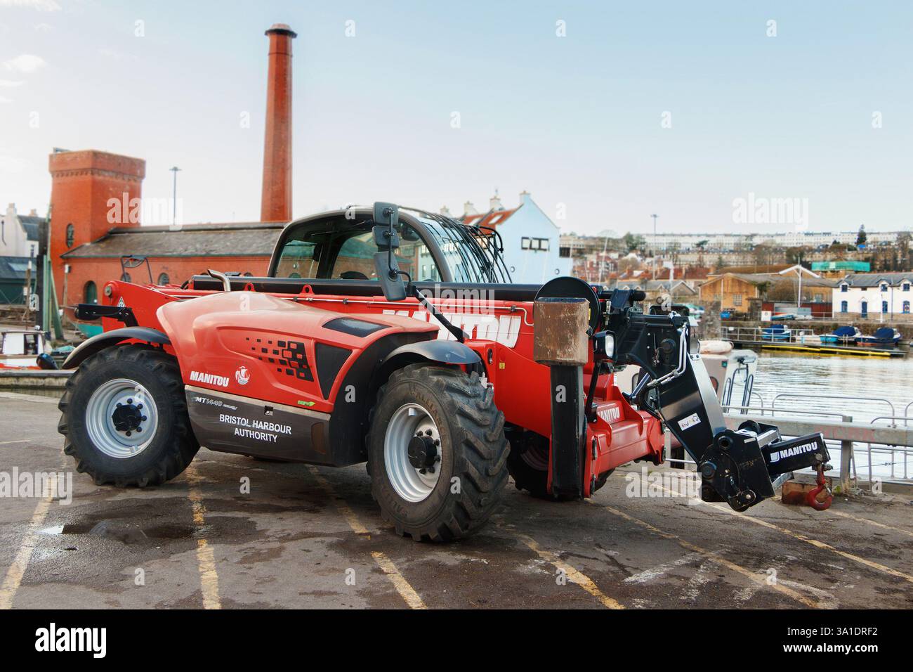 Red Manitou telescopic handler parked at Bristol docks & Harbour with ...