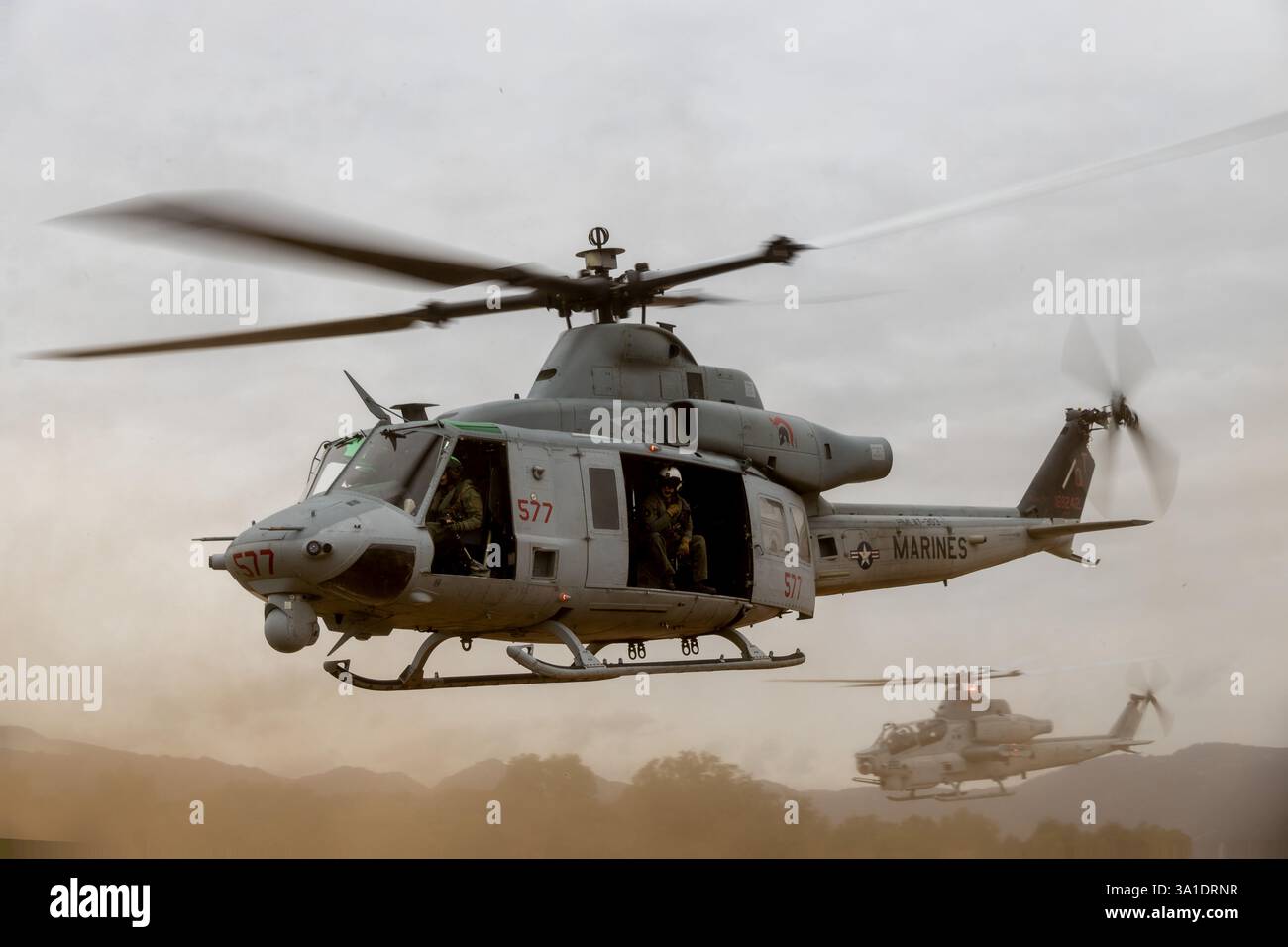A U.S. Marine Corps UH-1Y Venom and an AH-1Z Viper, both with Marine ...