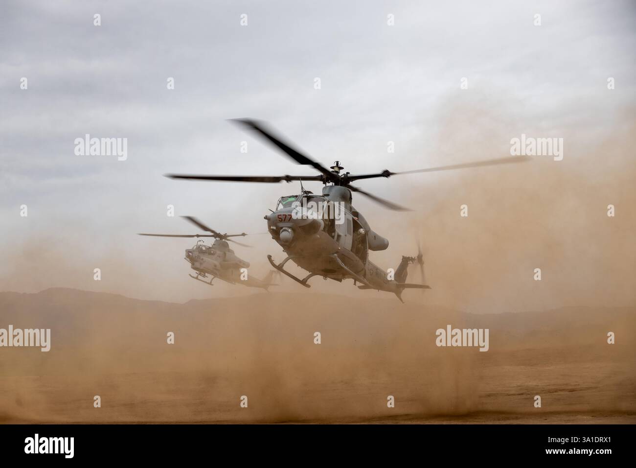 A U.S. Marine Corps UH-1Y Venom and an AH-1Z Viper, both with Marine ...
