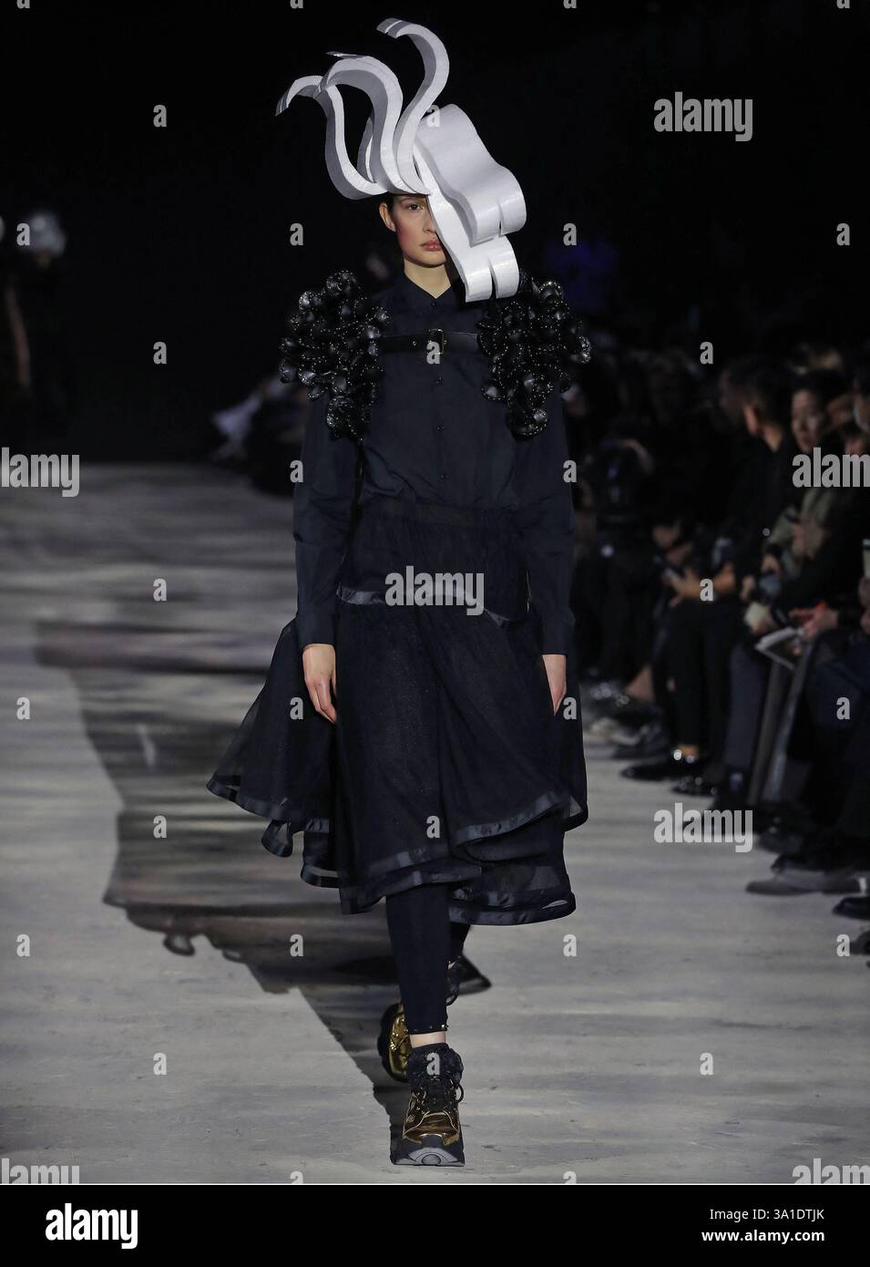 Paris, France. 08th Mar, 2025. A model walks the runway during the Noir ...