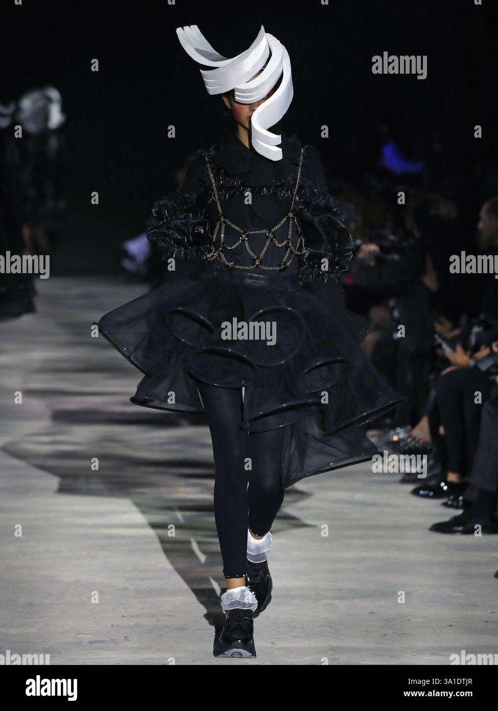 Paris, France. 08th Mar, 2025. A model walks the runway during the Noir ...
