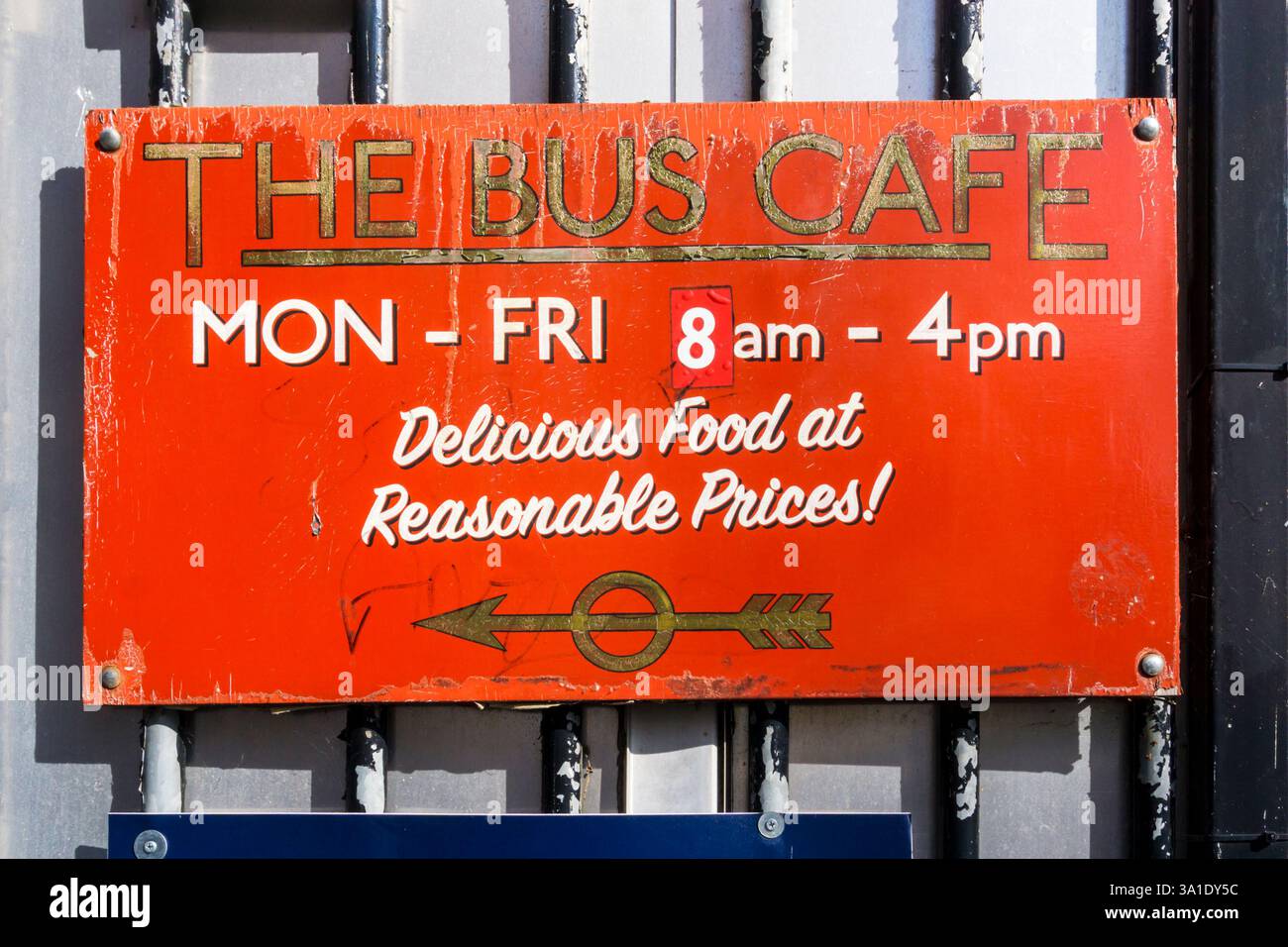 A sign for The Bus Cafe at Waterloo bus garage in south London Stock ...
