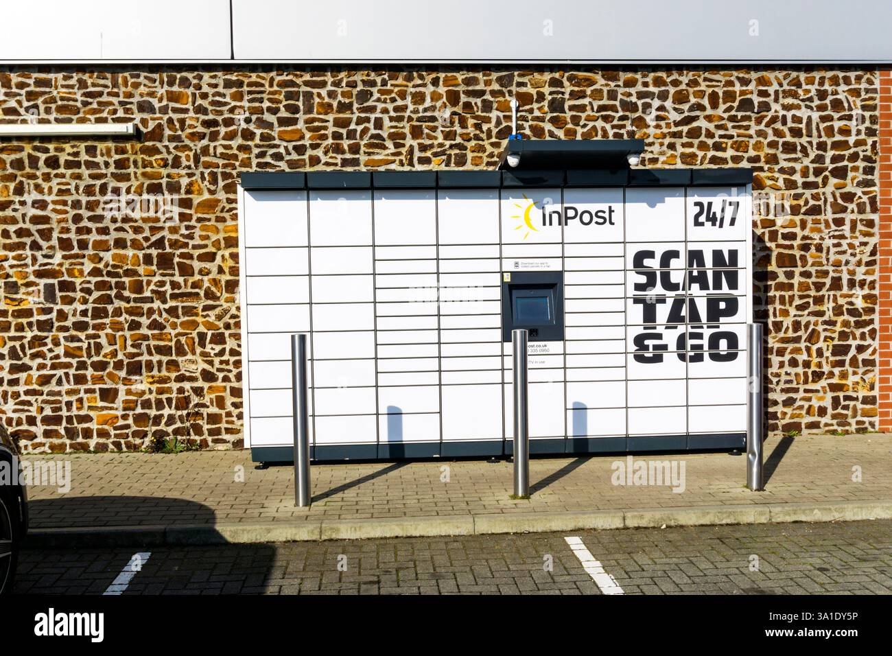 An InPost parcel locker in a supermarket car park Stock Photo - Alamy