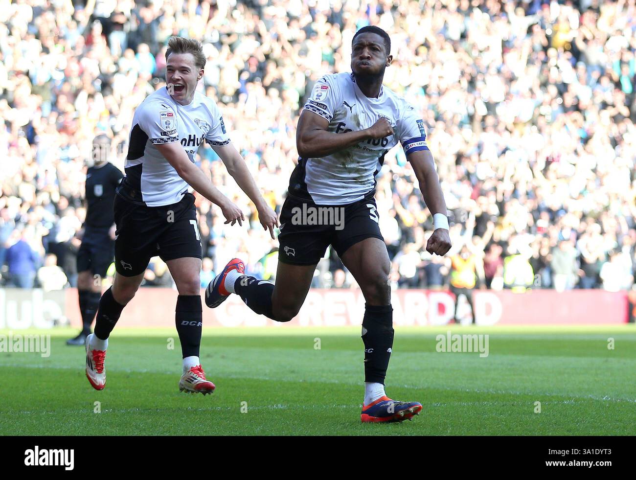 Derby County's Ebou Adams (right) celebrates after scoring his sides ...