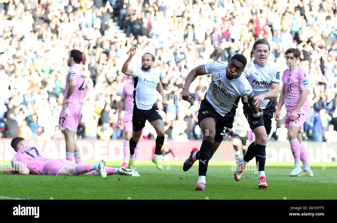 Derby County's Ebou Adams (second right) celebrates after scoring his ...