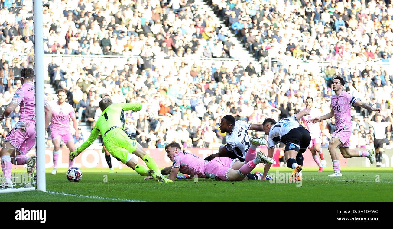 Derby County's Ebou Adams (centre right) scores his sides second goal ...