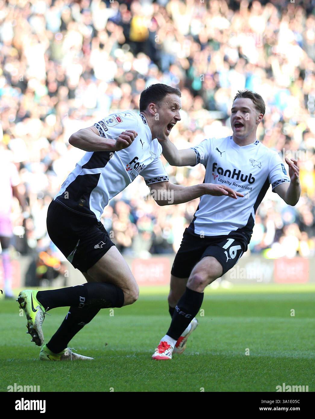 Derby County's Craig Forsyth (left) celebrates with Liam Thompson after ...