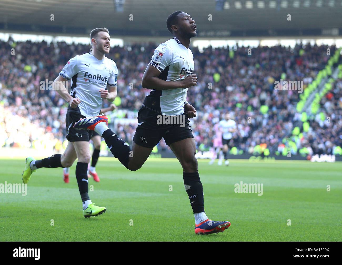 Derby County's Ebou Adams (right) celebrates after scoring his sides ...