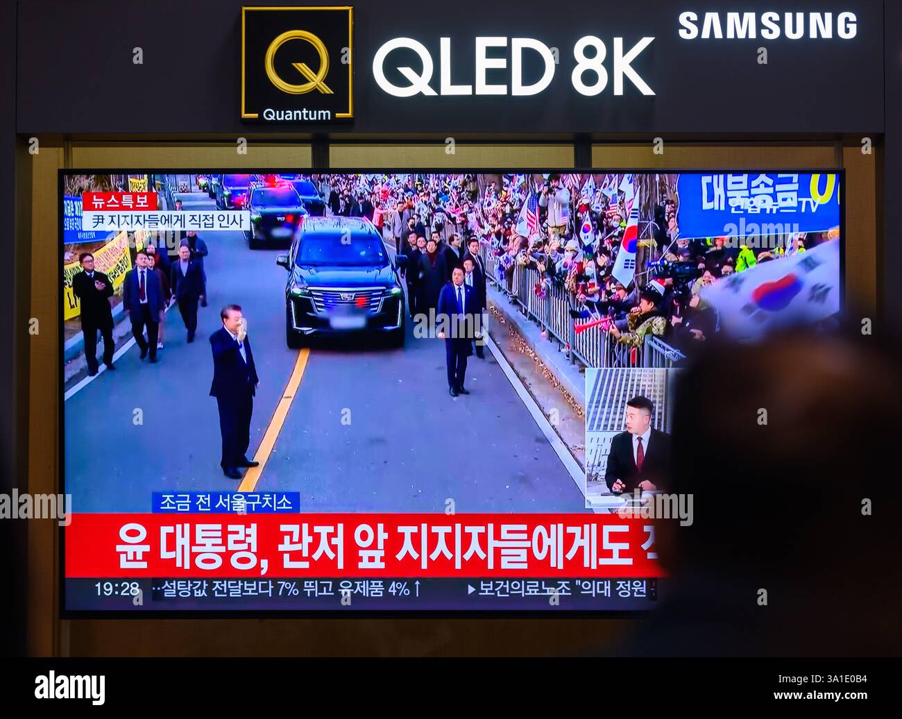A 24-hour Yonhap news TV broadcast at Seoul Railway Station showing a ...
