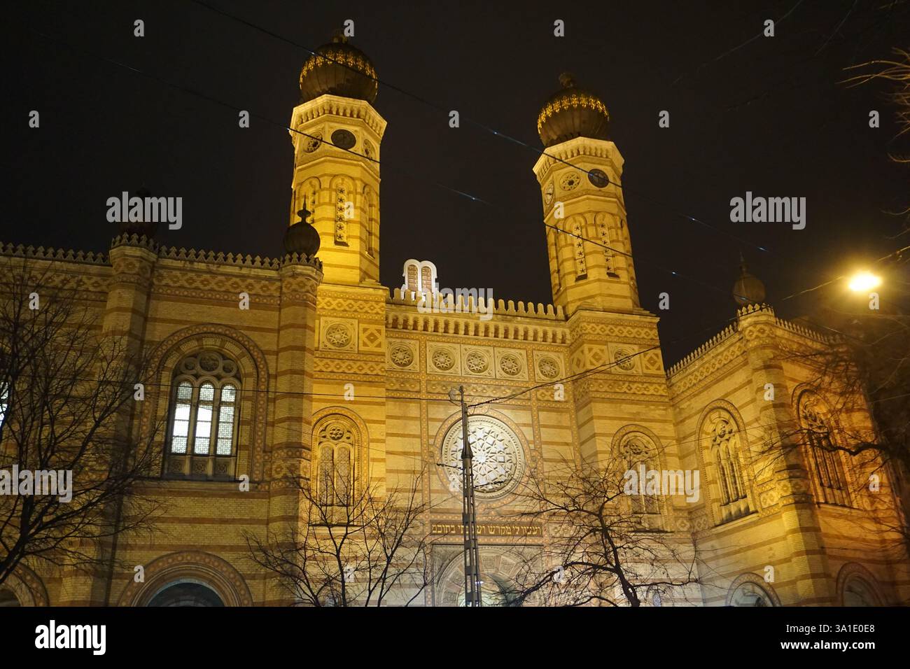 Side view of the illuminated facade Dohány Street Synagogue, or Great ...