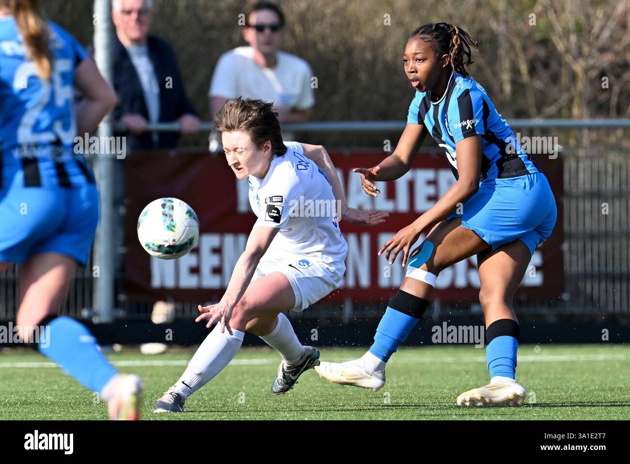 Gwyneth Vanaenrode (5) of Genk and Kadidia Traore (93) of Club YLA pictured during a female ...