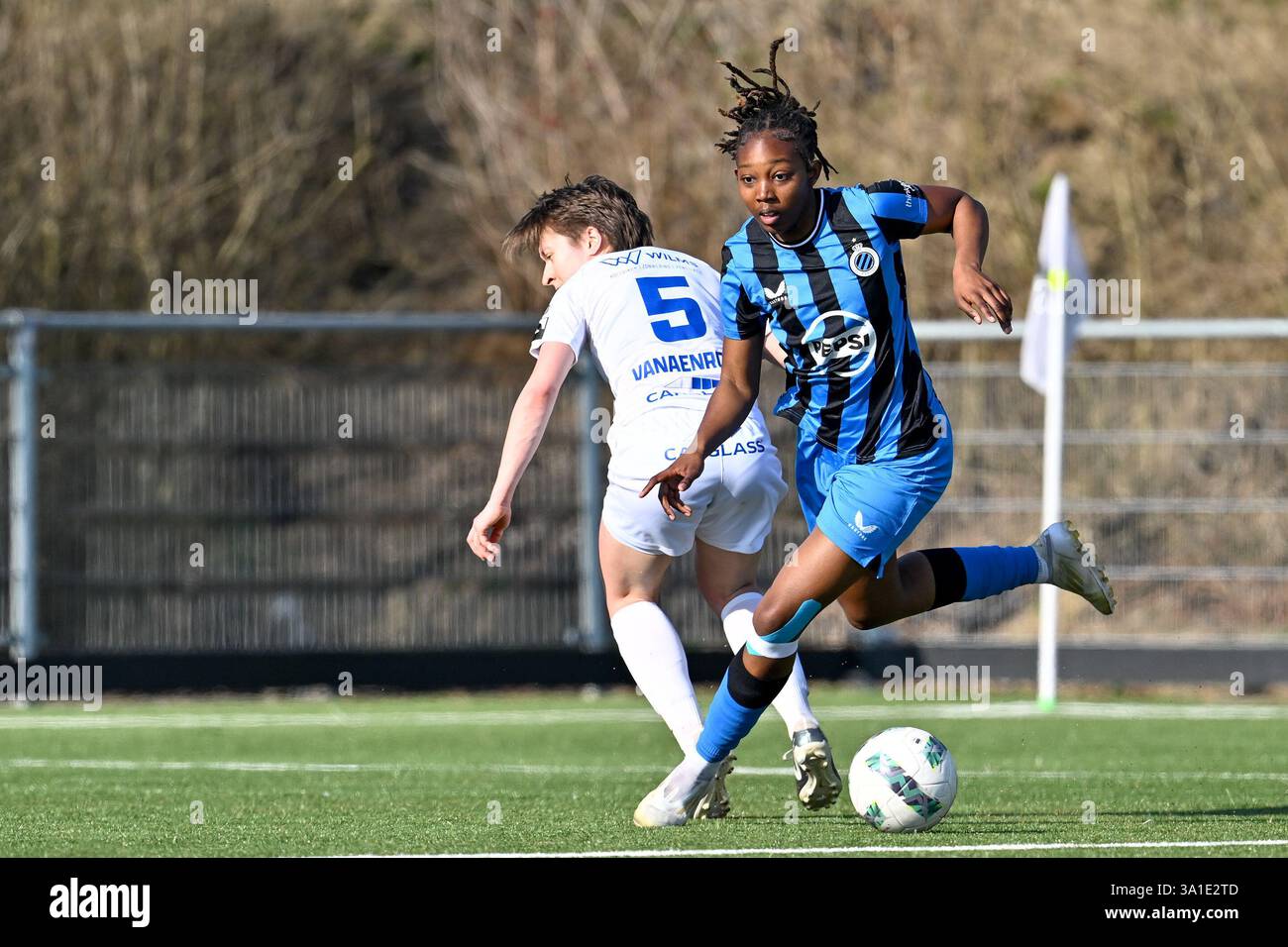 Gwyneth Vanaenrode (5) of Genk pictured defending on Kadidia Traore (93) of Club YLA during a ...