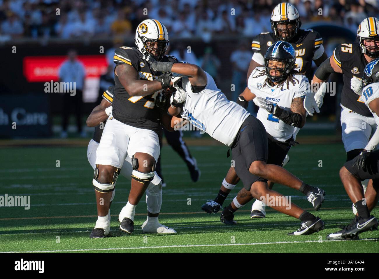 Missouri guard Armand Membou, left, in action during the first half of ...