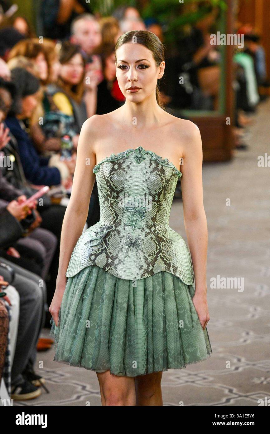 Paris, France. 08th Mar, 2025. A model walks the runway during the ...