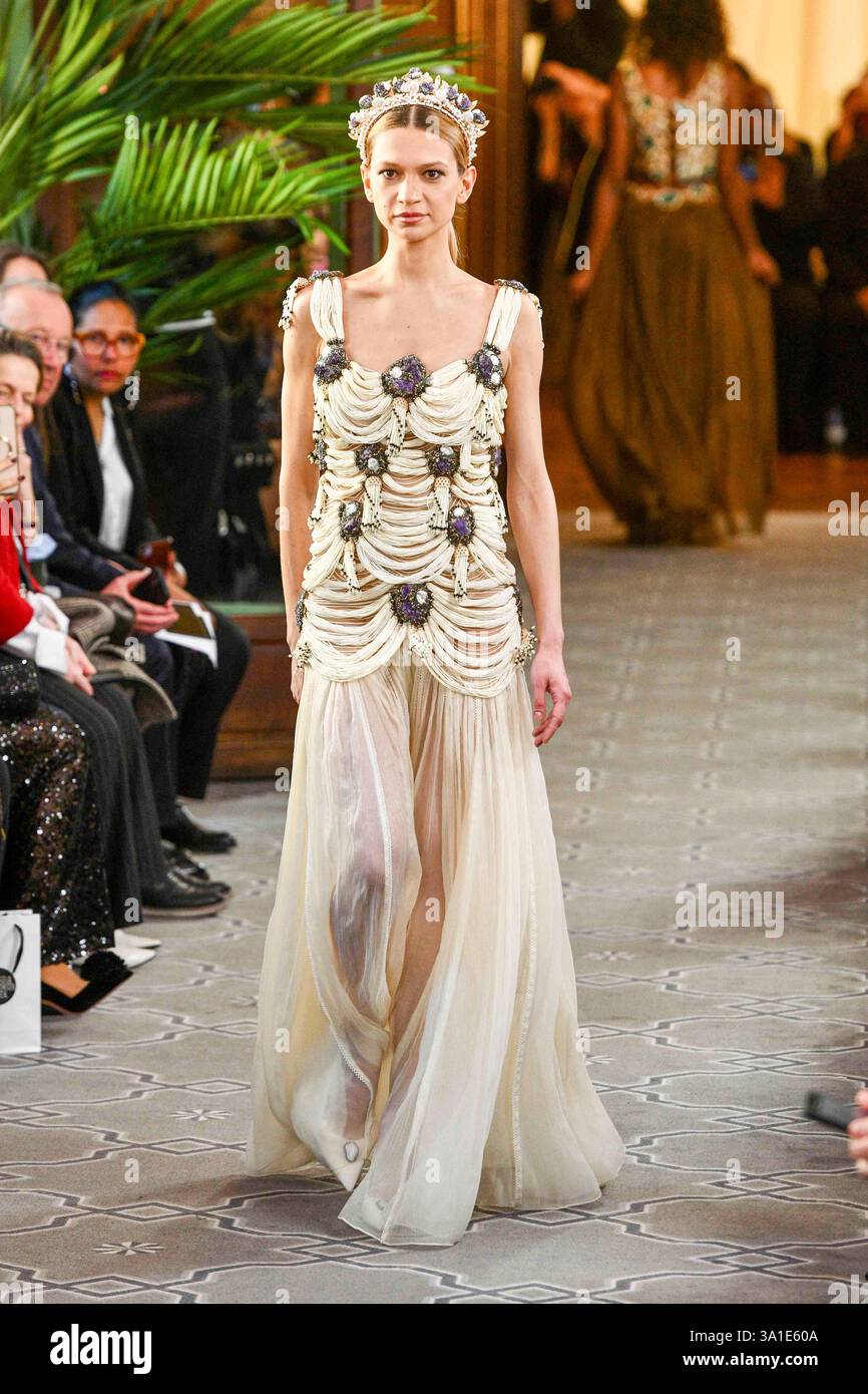 Paris, France. 08th Mar, 2025. A model walks the runway during the ...