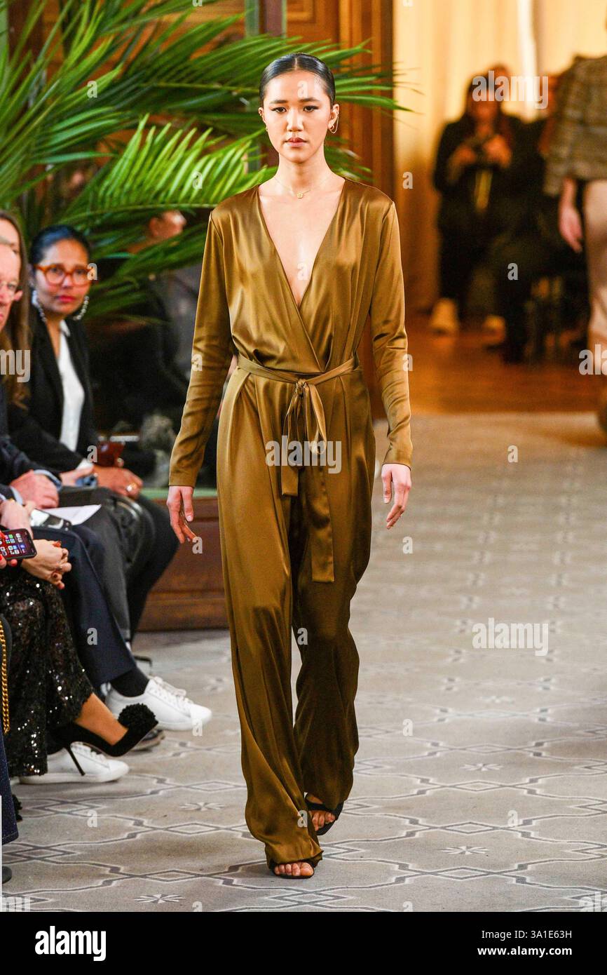 A model walks the runway during the Serbia Fashion Week Runway ...