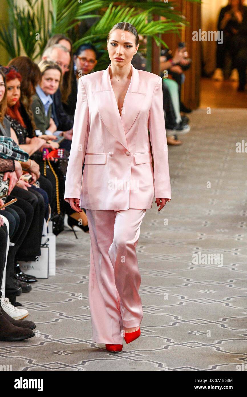 A model walks the runway during the Serbia Fashion Week Runway ...