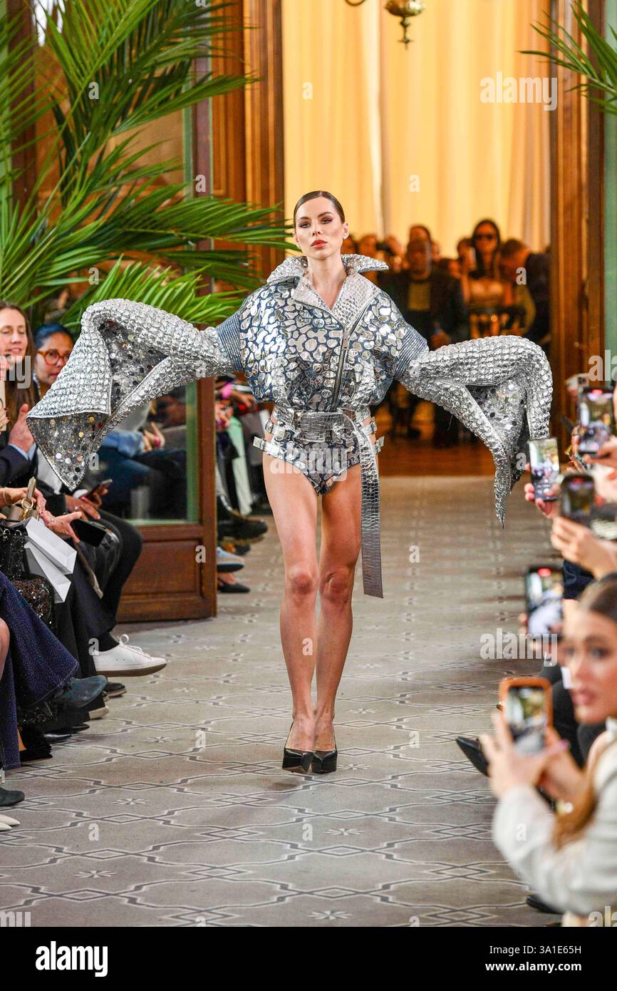 Paris, France. 08th Mar, 2025. A model walks the runway during the ...