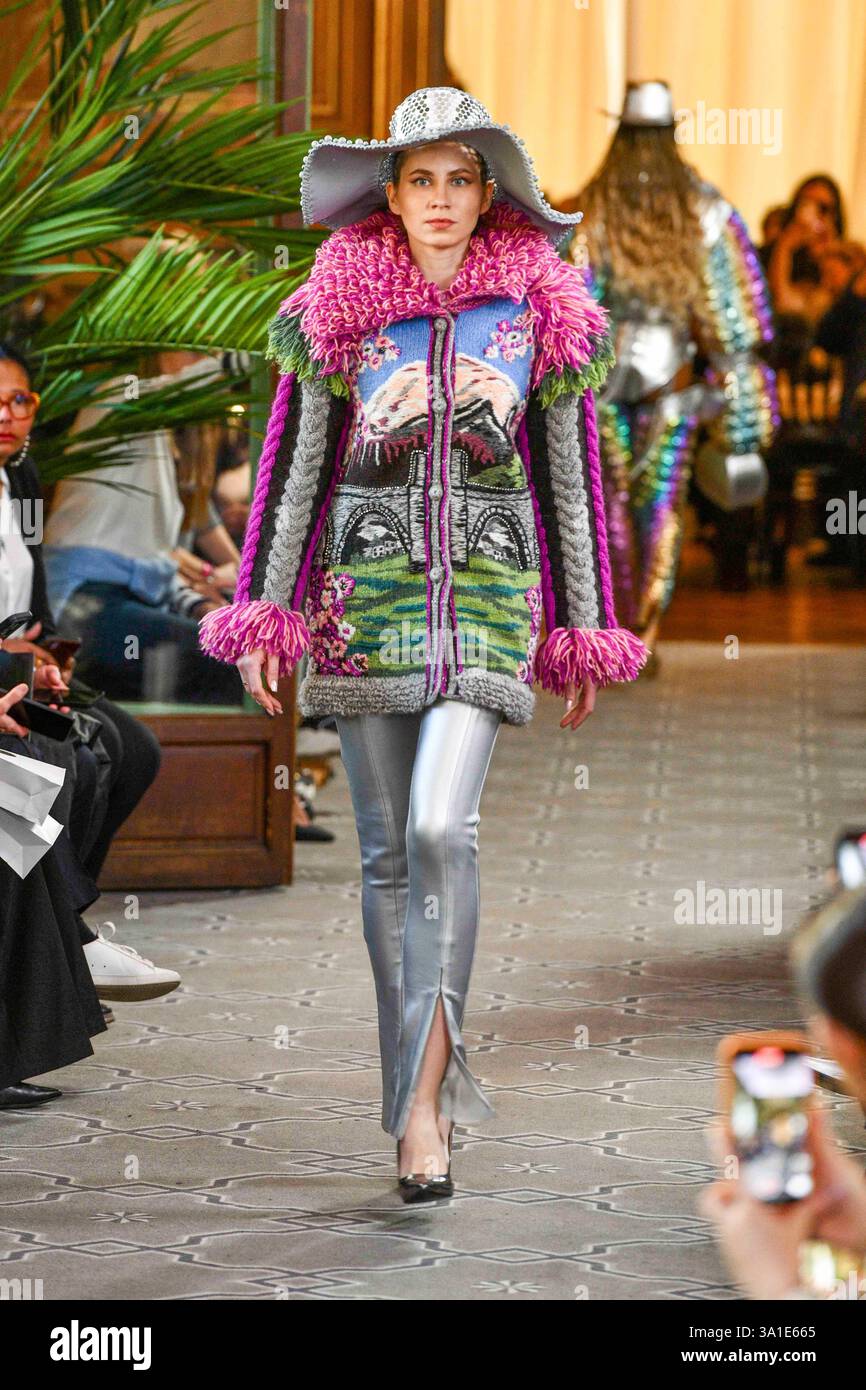 Paris, France. 08th Mar, 2025. A model walks the runway during the ...