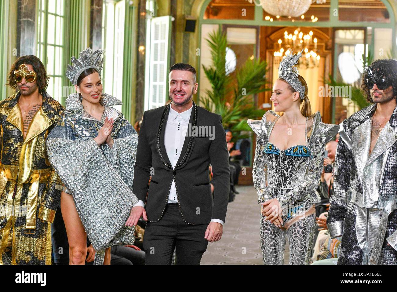 A model walks the runway during the Serbia Fashion Week Runway ...