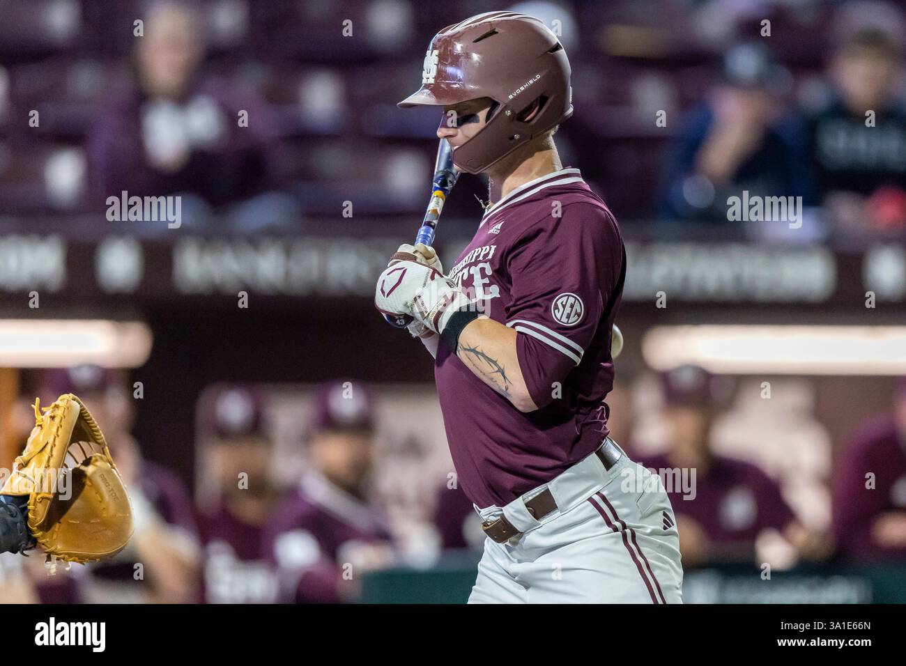Mississippi State infielder Dylan Cupp (10) is hit by a pitch from ...