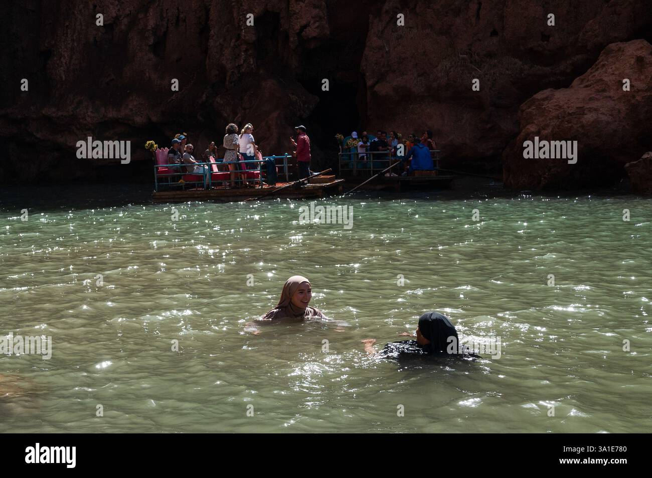 OUZOUD, MOROCCO - OCTOBER 5, 2024: Two Moroccan women in swimsuit ...
