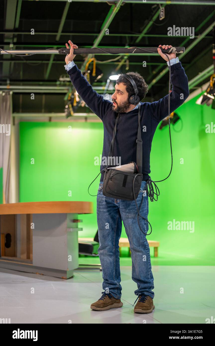 Boom microphone operator testing hi-res stock photography and images ...