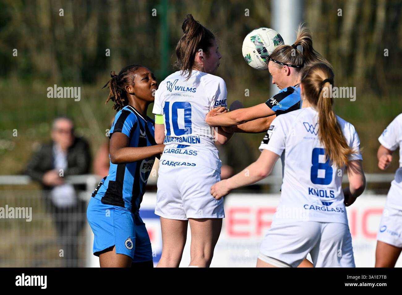 Kadidia Traore (93) of Club YLA, Sien Vandersanden (10) of Genk and Fleur Pauwels (17) of Club ...