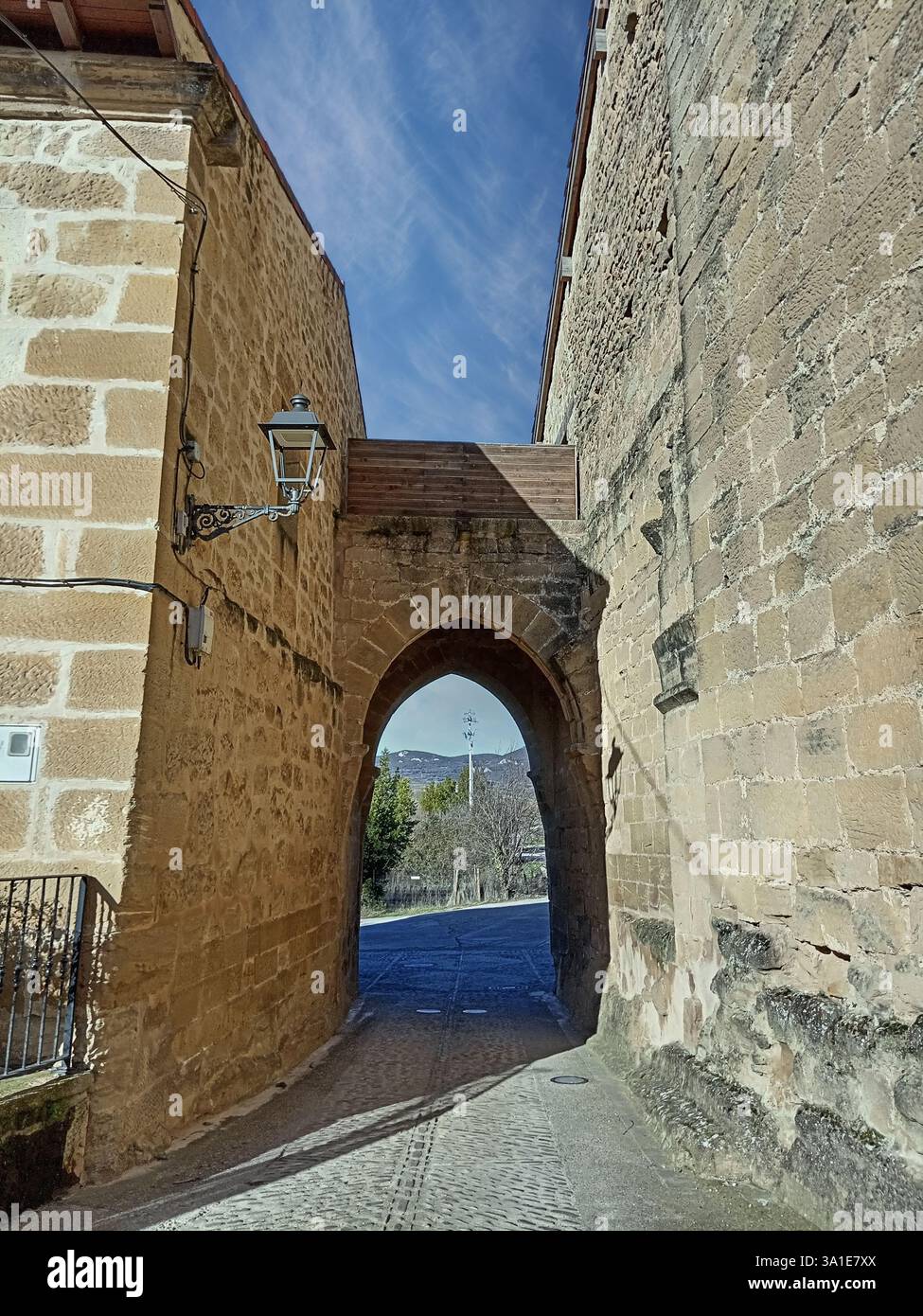 A well-preserved medieval stone gateway in Sajazarra, Spain, featuring ...