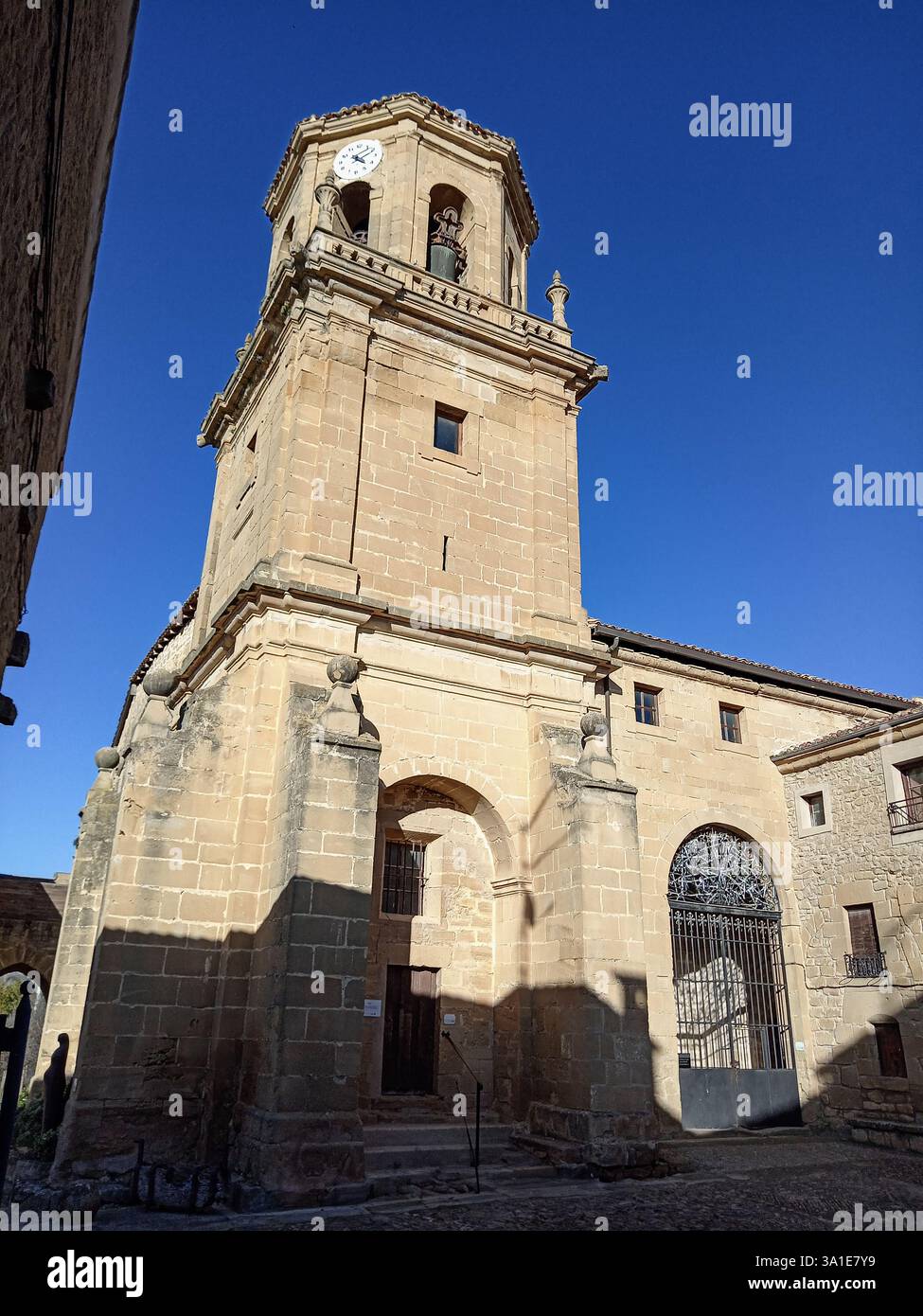 The impressive bell tower of Santa Maria de la Asuncion Church in ...