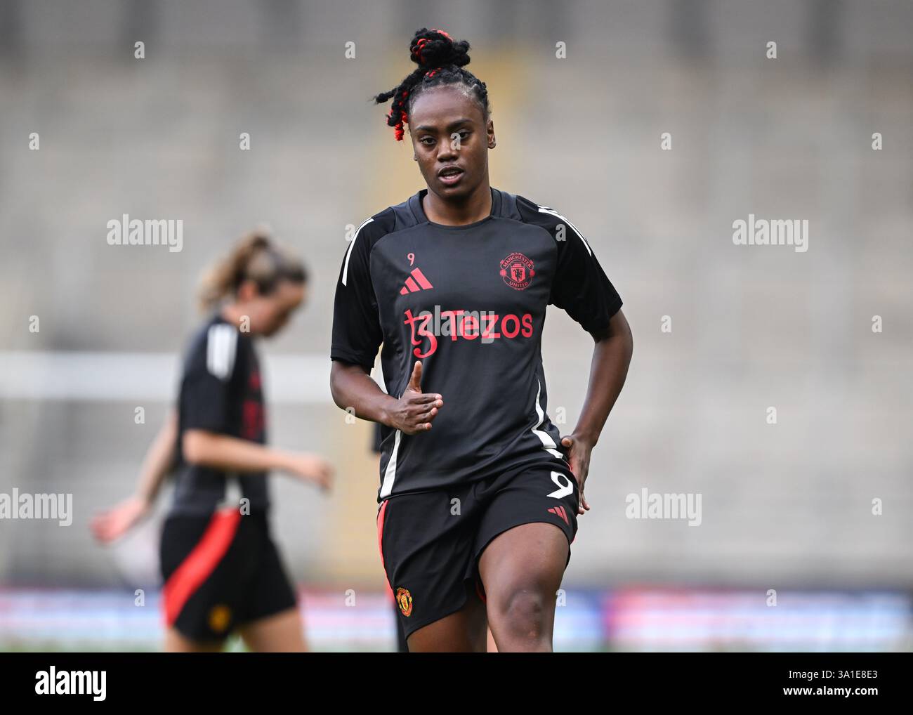 Manchester United's Melvine Malard warms up ahead of the Adobe Women's ...