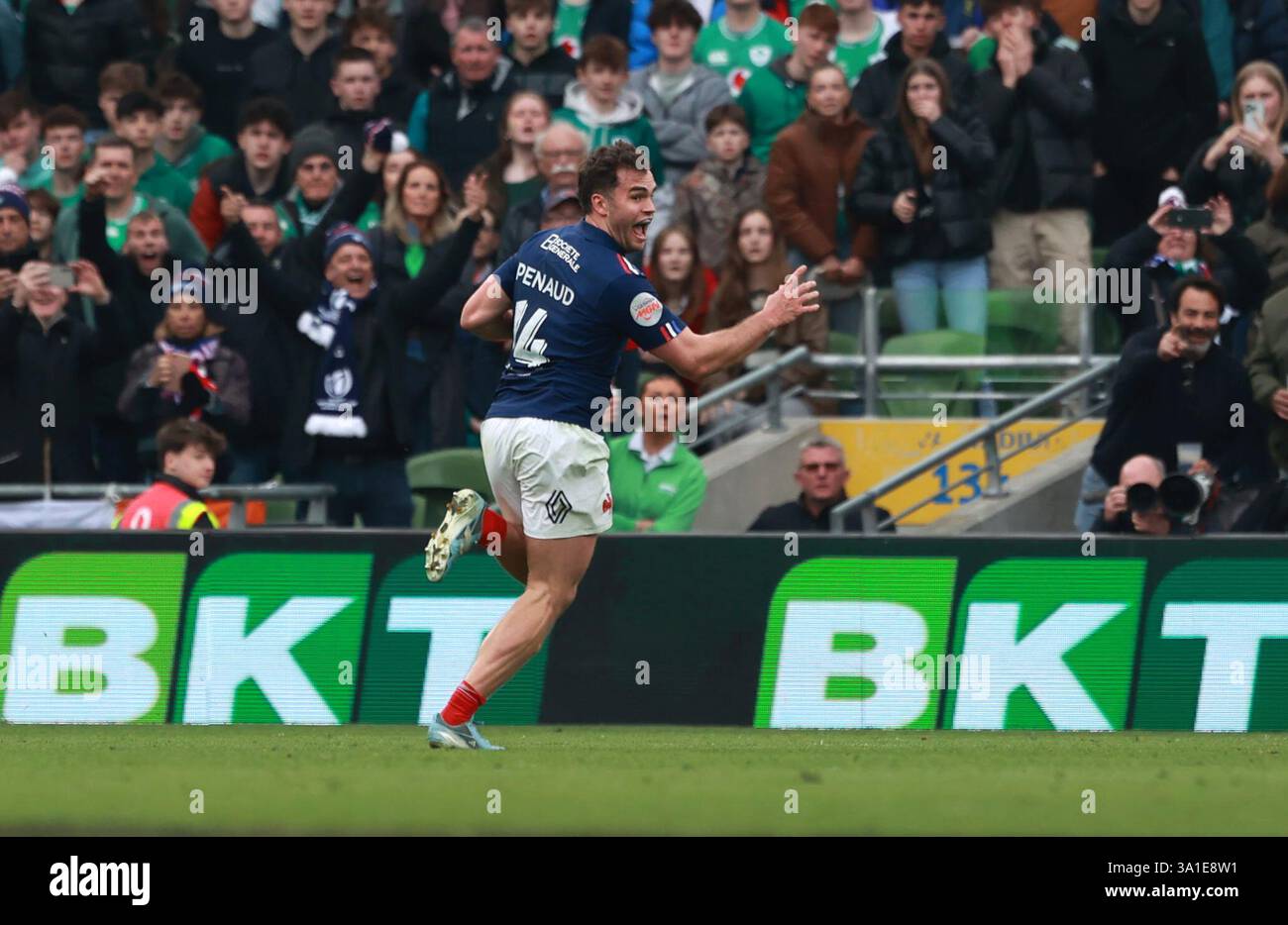 France's Damian Penaud scores their side's fifth try of the game during ...