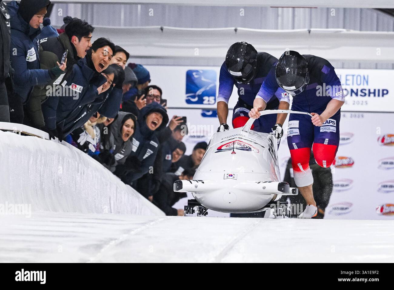 LAKE PLACID, NY, UNITED STATES - MARCH 08: Jinsu Kim and Hyeonggeun Kim ...