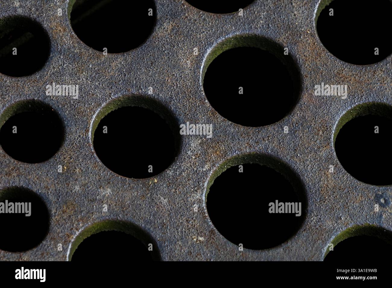 Close-up of rusted metal grates, showcasing their aged texture and ...