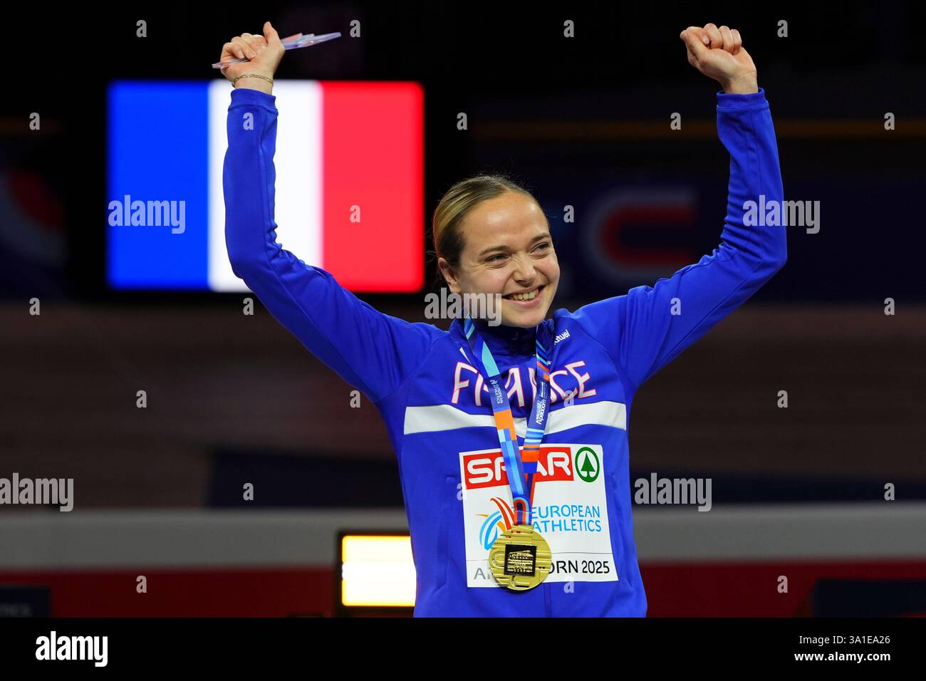 France's Agathe Guillemot stands on the podium after winning the 1500 ...