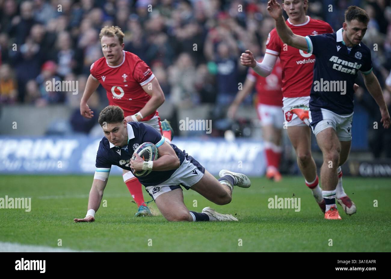 Scotland's Tom Jordan scores their side's second try of the game during ...