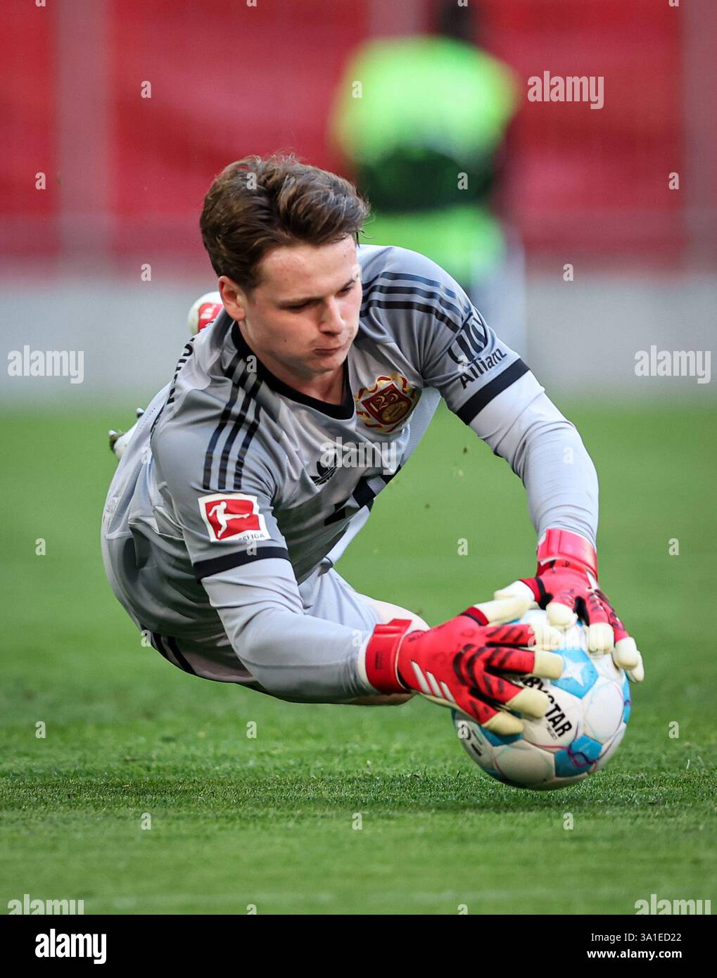 MUNICH, GERMANY - MARCH 08: Jonas Urbig of Bayern Muenchen in action ...