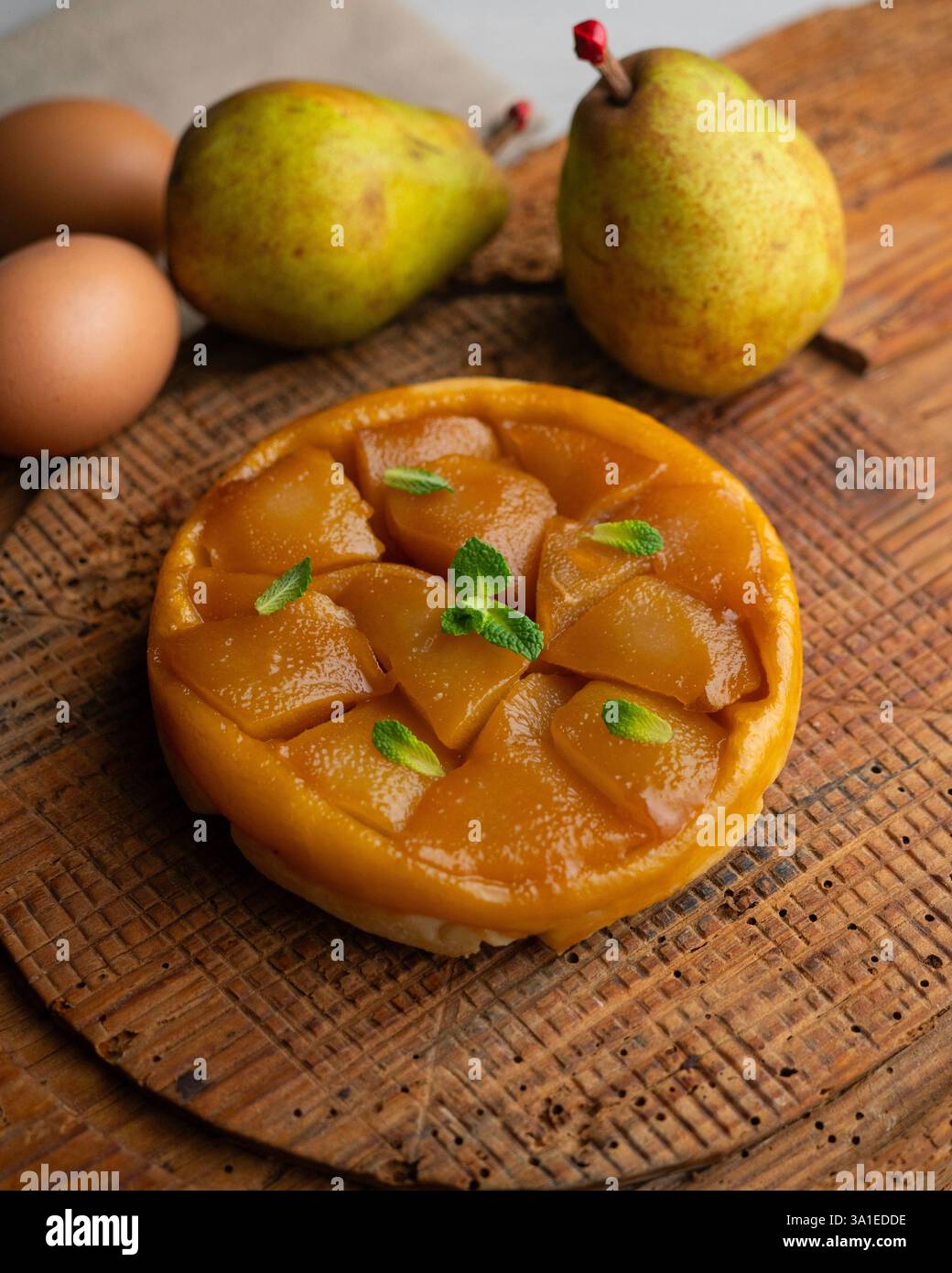 Pear tart tatin made with a traditional French recipe in a Paris ...