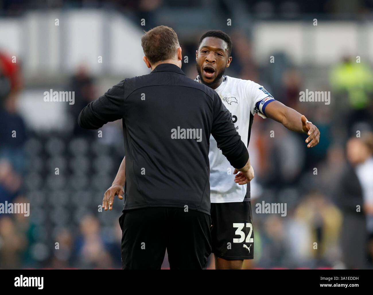 Derby County manager John Eustace (left) celebrates with Ebou Adams ...