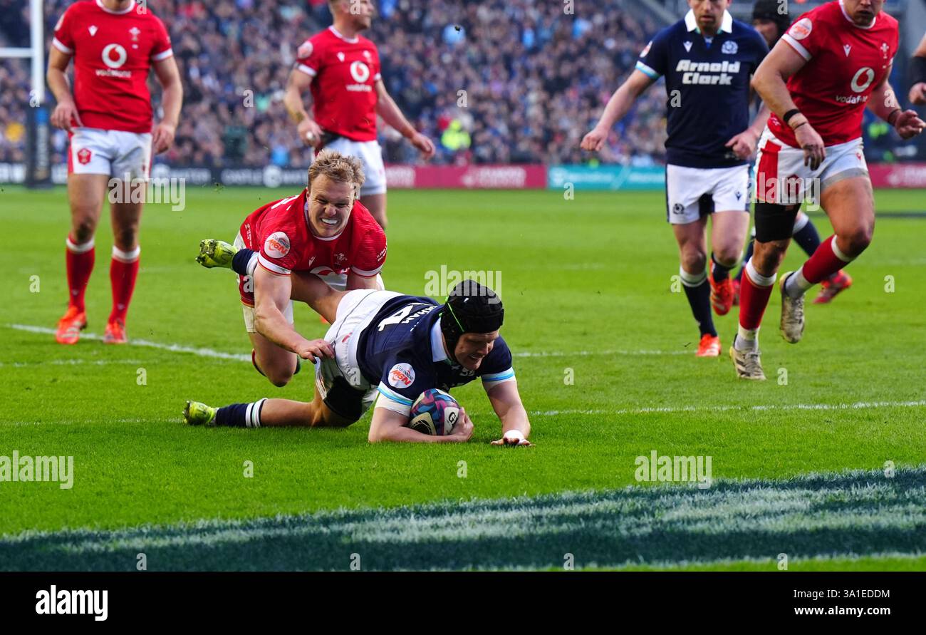 Scotland's Darcy Graham scores their side's third try of the game ...