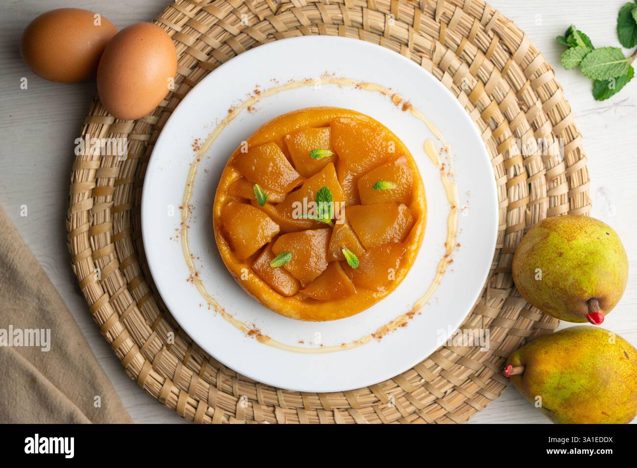 Pear tart tatin made with a traditional French recipe in a Paris ...