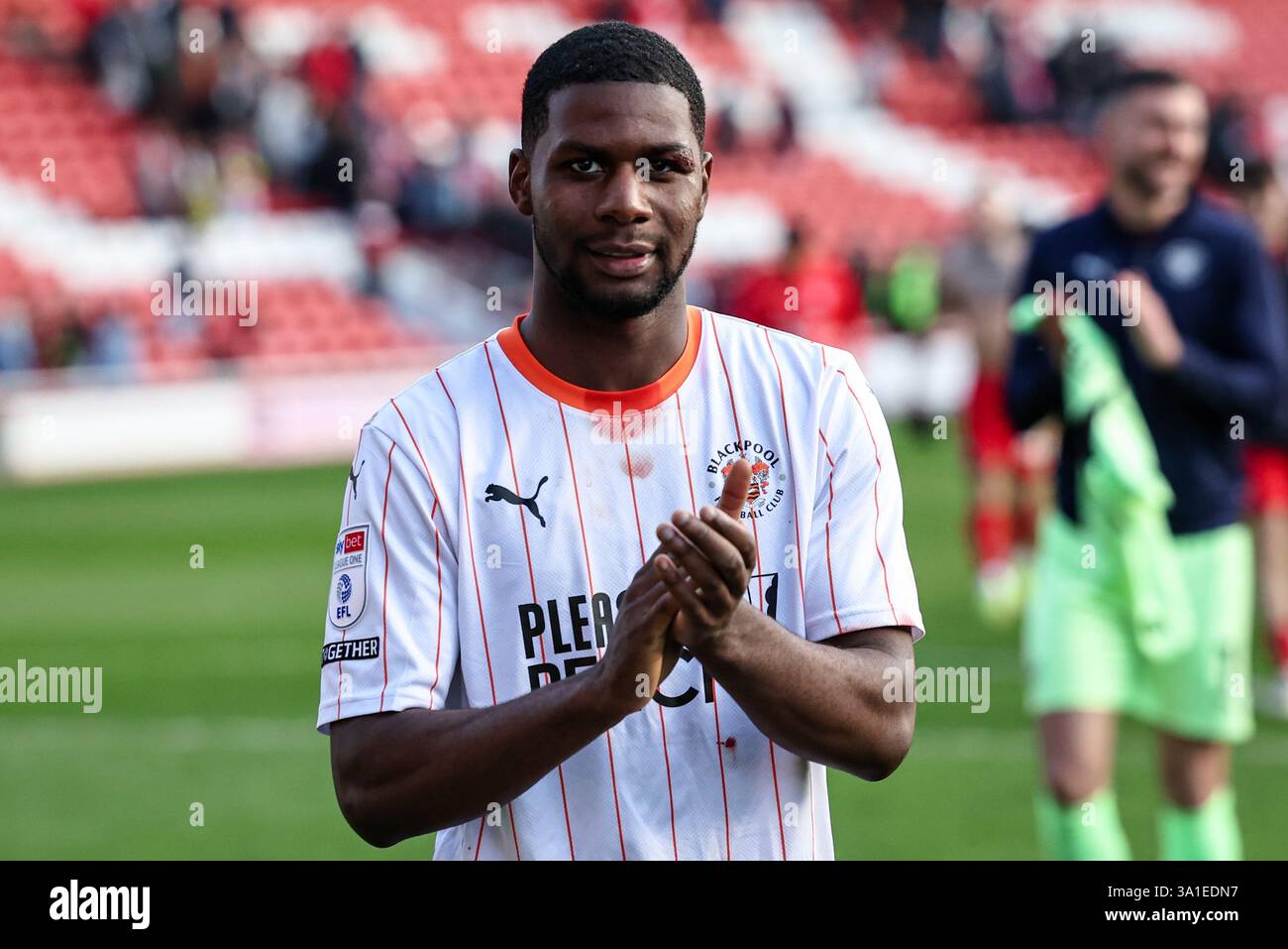 Barnsley, UK. 08th Mar, 2025. Odel Offiah of Blackpool applauds the ...