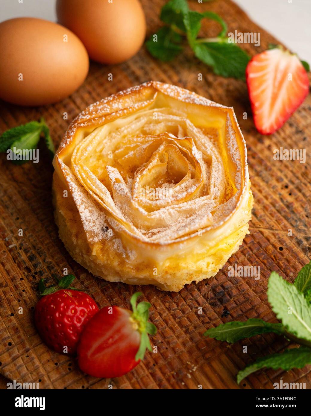 Floral-shaped cake made with brick dough and a pastry cream with egg ...