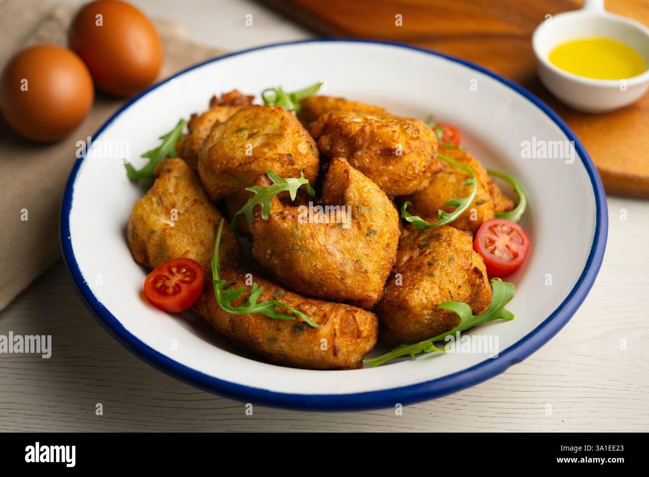 Delicious dish with fish fritters. Traditional Spanish recipe for Holy ...
