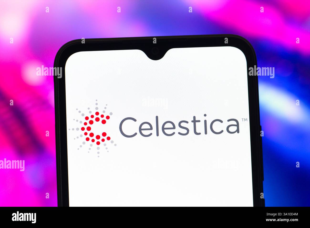In this photo illustration, the Celestica logo is seen displayed on a smartphone screen Stock ...
