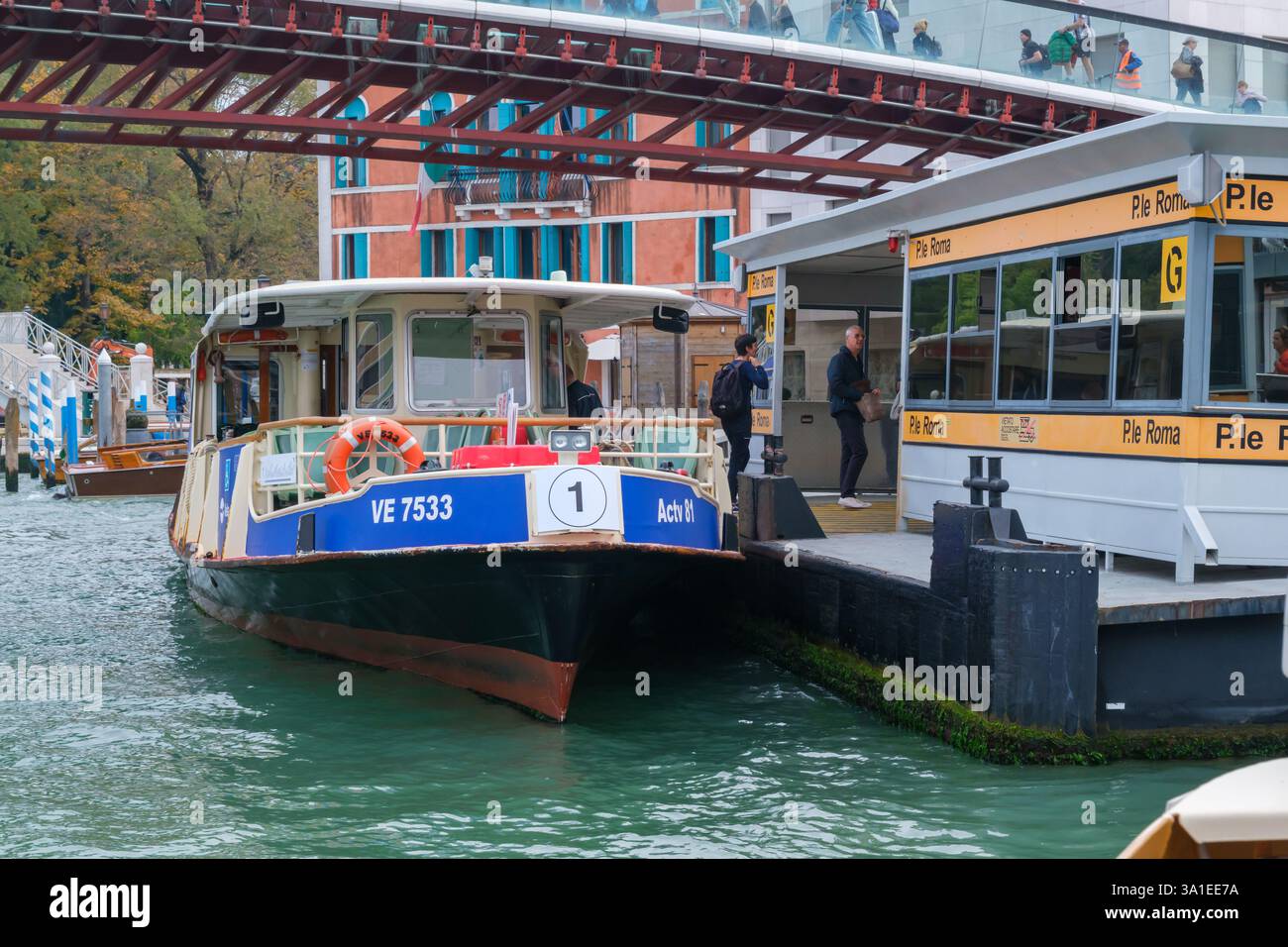 Venice, Italy - 12 October 2024: a water bus at P.le Roma station with ...