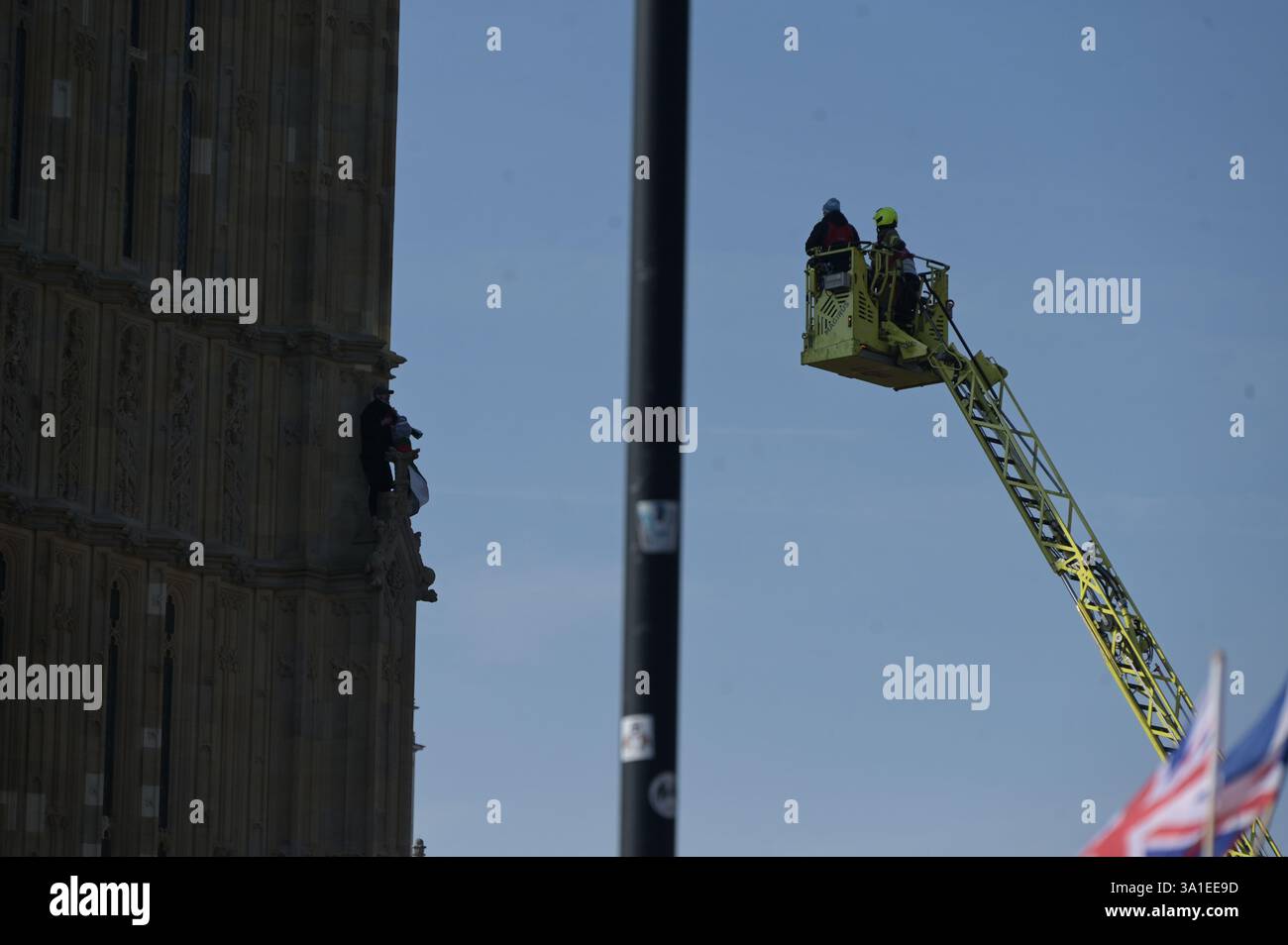 LONDON, UK. 8th Mar, 2025. A barefoot protestor holding a Palestinian ...